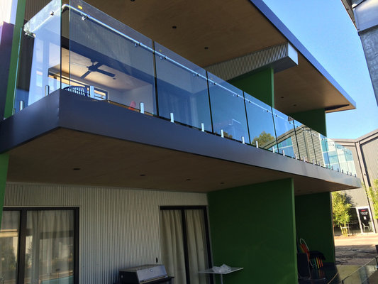 Exterior balcony glass balustrade with stainless steel spigots glass railing