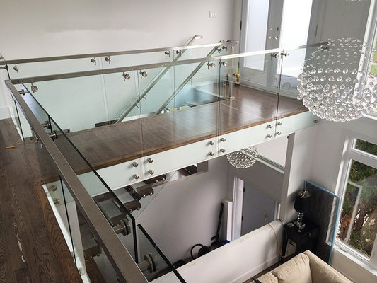 Glass railing designs with stainless steel standoff  for porch railing