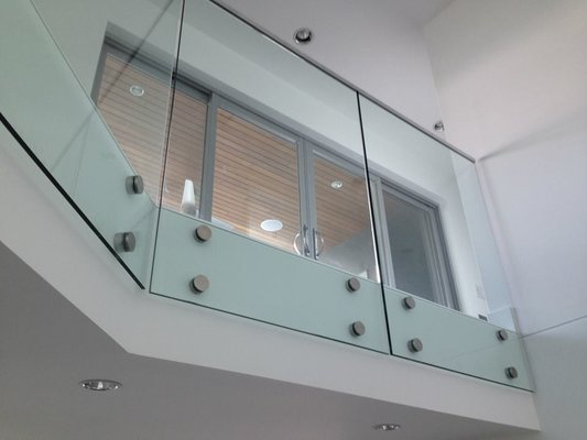 Modern design glass railing with stainless steel standoff  for veranda