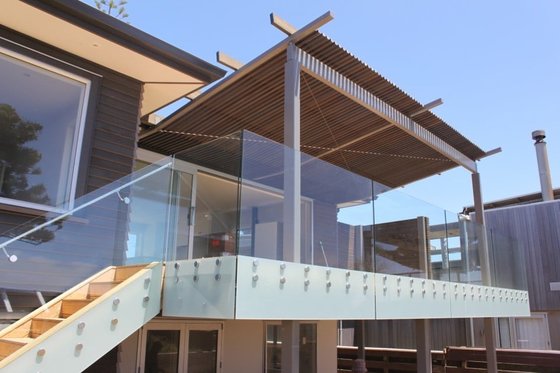 Modern design glass railing with stainless steel standoff  for veranda
