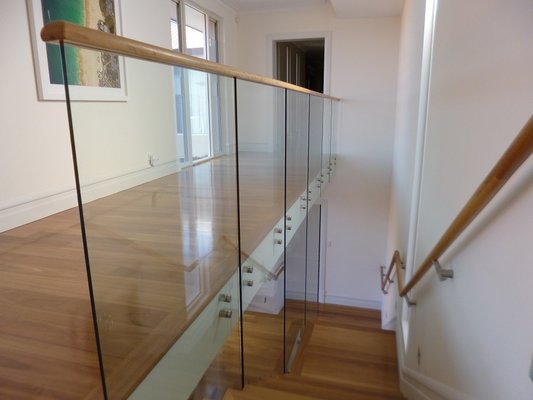 Modern design glass railing with stainless steel standoff  for veranda