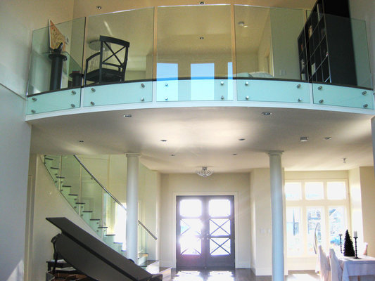 Tempered tinted glass railing with stainless steel standoff / patch fitting railing
