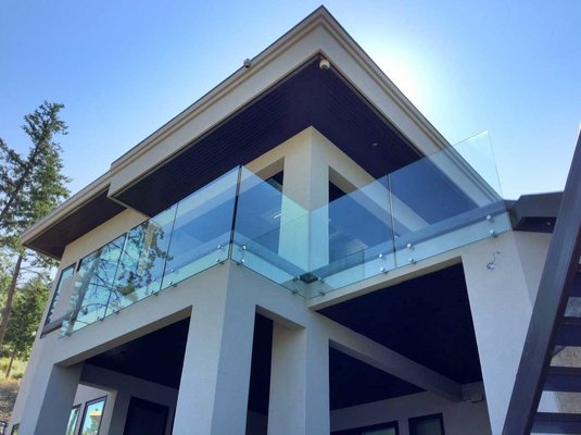 Free design tinted glass balustrade with stainless steel patch fitting