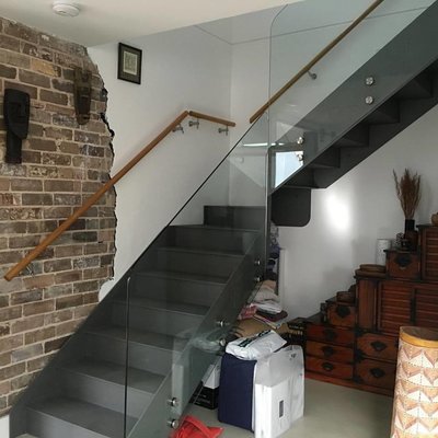 Exterior straight staircase with carbon steel stringer for building design