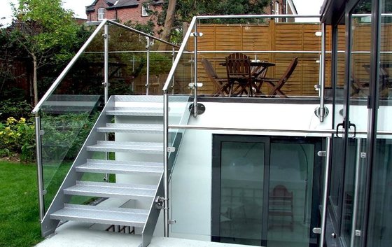Exterior straight staircase with carbon steel stringer for building design