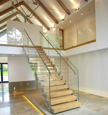 Interior wooden straight staircase with glass railing free design