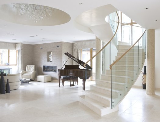 Interior wooden straight staircase with glass railing free design