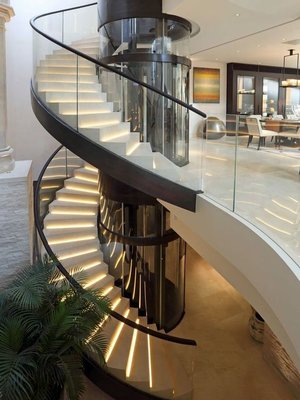 Side-mounted solid wood handrail glass railing prefabricated curved stairs