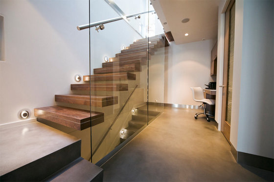 Interior glass wall railing floating staircase with wooden steps design