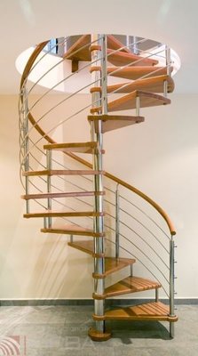 Interior spiral staircase with wooden steps glass railing design