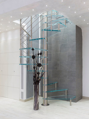 Interior spiral staircase with wooden steps glass railing design