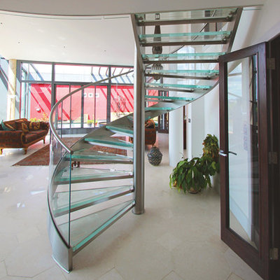 Interior glass spiral staircase with inox steel rod railing design