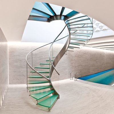 Interior glass spiral staircase with inox steel rod railing design