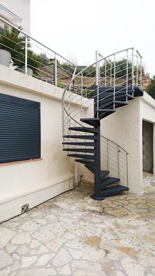 Duplex use spiral staircase with stainless steel railing design