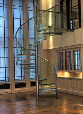 Inside spiral staircase with stainless steel railing design