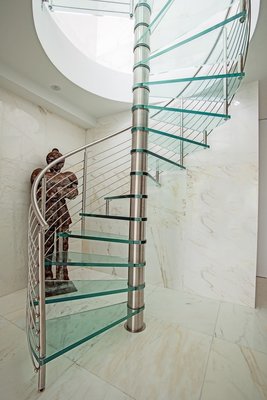 Inside spiral staircase with stainless steel railing design