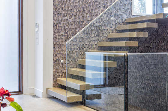 Modern use closed tread floating staircase for Mauritius design