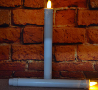 Led Moving Wick Battery Operated Taper Candles In Ivory