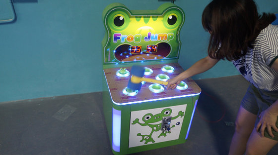 LED Crazy Frog Coin Operated Arcade Machine 40KG Weight With 100W Power