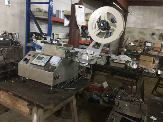 Fully Automatic Logo Ribbon Cutting Machine Manufacturers 60L*44W*44Hmm