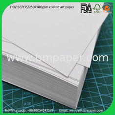China 80 90 100 250 270 280 300 350 g gram gra gsm c2s coated glossy art paper couche paper with package in roll or in ream supplier