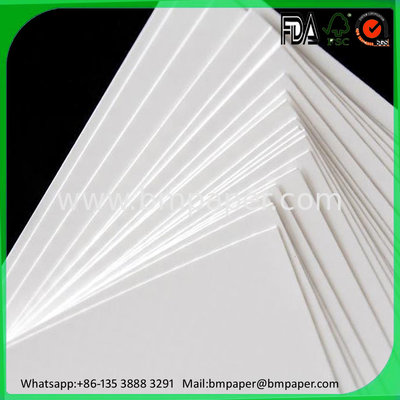 66*96 70*100cm couche paper C2S Glossy Coated Art Paper Art Card Paper board with sheets ream or roll package supplier
