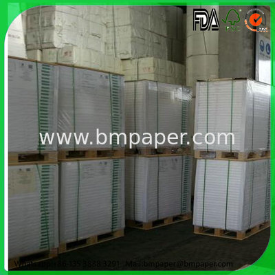 66*96 70*100cm couche paper C2S Glossy Coated Art Paper Art Card Paper board with sheets ream or roll package supplier