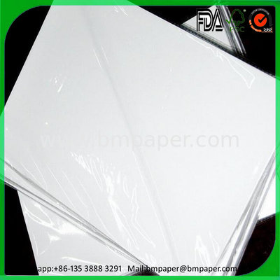 660*960 700*1000mm couche paper C2S Glossy Coated Art Paper Art Card Paper board with sheets ream or roll package supplier