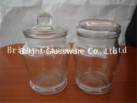 Shaped glass candle jar with lid