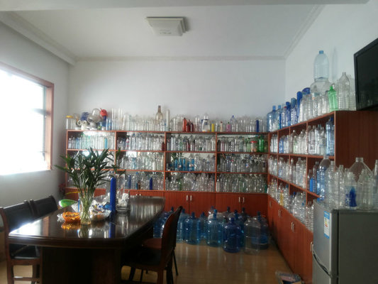 PET Semi automatic plastic water bottle blowing moulding making machine prices supplier