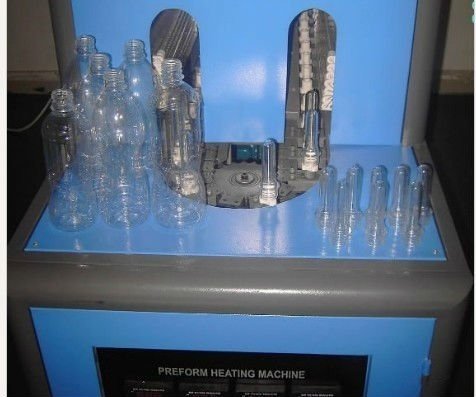 Semi Automatic 2 Cavity Small Plastic Pet Bottle Blow Molding Machine/Water Bottle Blowing Plant supplier