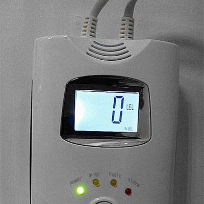 Kitchen cooking natural gas leakage alarm with semi-conductive sensor and metal frame