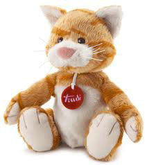 La peluche promotionnelle de Brown joue la peluche de chat avec l'insigne, reposant la pose