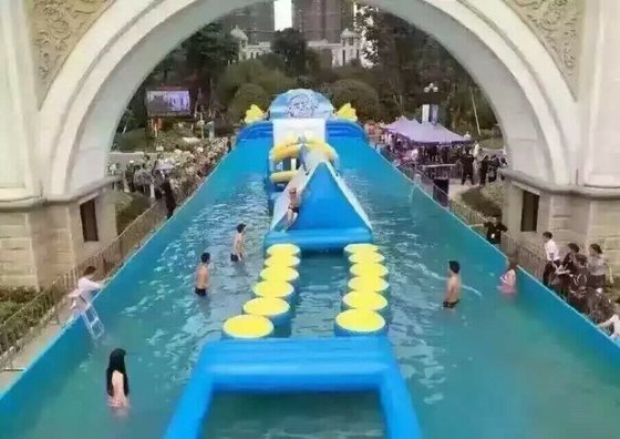 Customized 0.9MM Inflatable Sports Games Inflatable Water Parks Toys For Kids