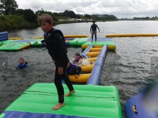 Large Frame Giant Inflatable Water Park With Slide Pool Climbing Wall Anti Tear