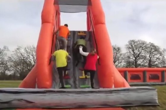 Giant inflatable amusement park or adventure park settle in plain & grassland for family
