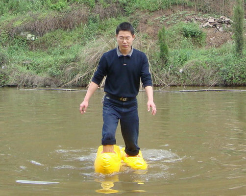 PVC Inflatable Water Toys / Walking Shoes For Walking In The Water , Durable