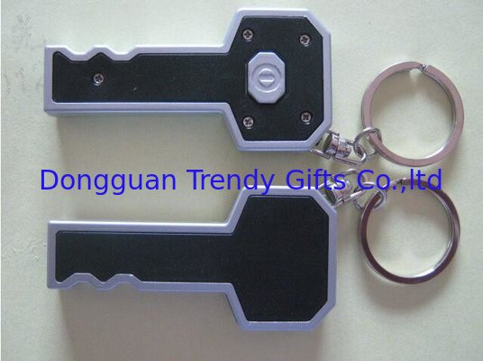 Custom Plastic Key Shape Led Flashlight Keychain / Led Torch Keychain 8*3.5CM For School Students Gift supplier