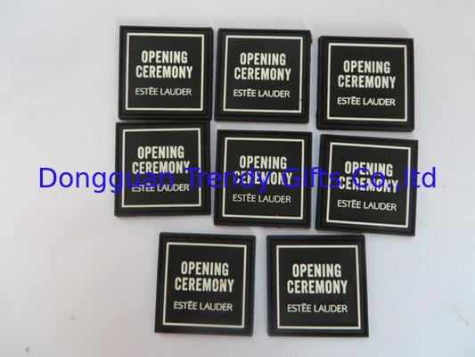 Custom Estee Lauder 3d Soft PVC Lapel Garment Label Black Color For Open Ceremony , Durable And Waterproof supplier