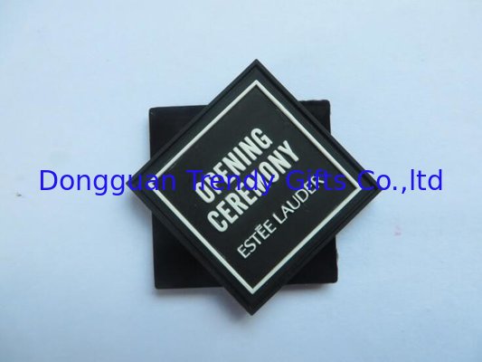 Custom Estee Lauder 3d Soft PVC Lapel Garment Label Black Color For Open Ceremony , Durable And Waterproof supplier