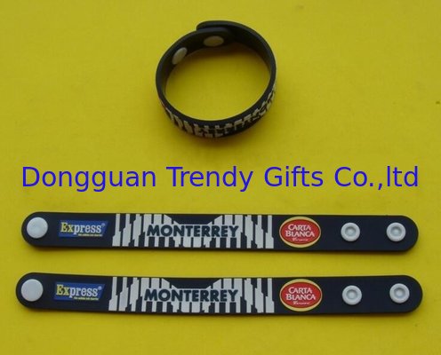 Personalized Soft PVC Rubber Wristband Sport Bracelet With Embossed Logo , Adjustable Size supplier