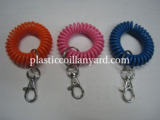 China Spiral wrist coil key chains orange pink blue popular colors w/split ring and thumb hook supplier