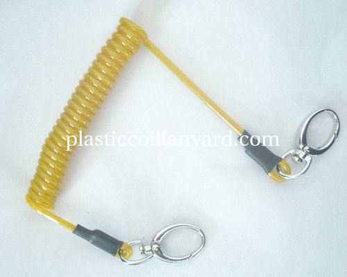 Flexible transparent yellow expanding spring coil tool lanyard with 2pcs oval metal hooks supplier