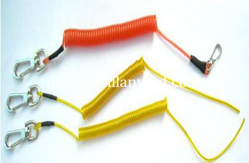 Flexible transparent yellow expanding spring coil tool lanyard with 2pcs oval metal hooks supplier