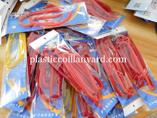 Standard poly bag package colors fish spring coiled lanyards to prevent acidental loss supplier
