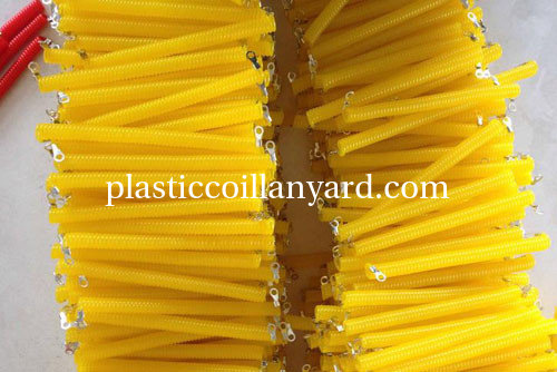 Custom factory direct offer clear spring security coil lanyard tether w/2 safety terminals supplier