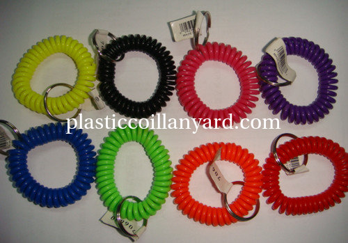 Custom coil size 2.5mm line cord plastic colorful spiral wrist band coil chain w/key ring supplier