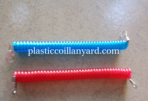 Stretchable spiral coil cord in different colors plastic spring safe wire coil holder rope supplier