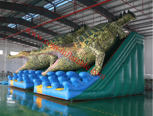 China inflatable slip n slide giant dinasour inflatable with slide inflatable bouncy castle supplier