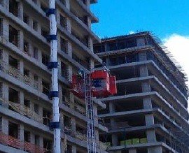 Red Passenger Hoist for Lifting Personnel and Material with High Secrurity supplier